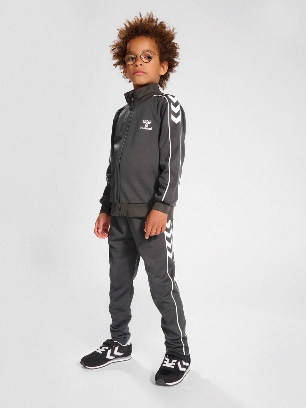 hummel TRACK TRACKSUIT - ASPHALT | hummel.net